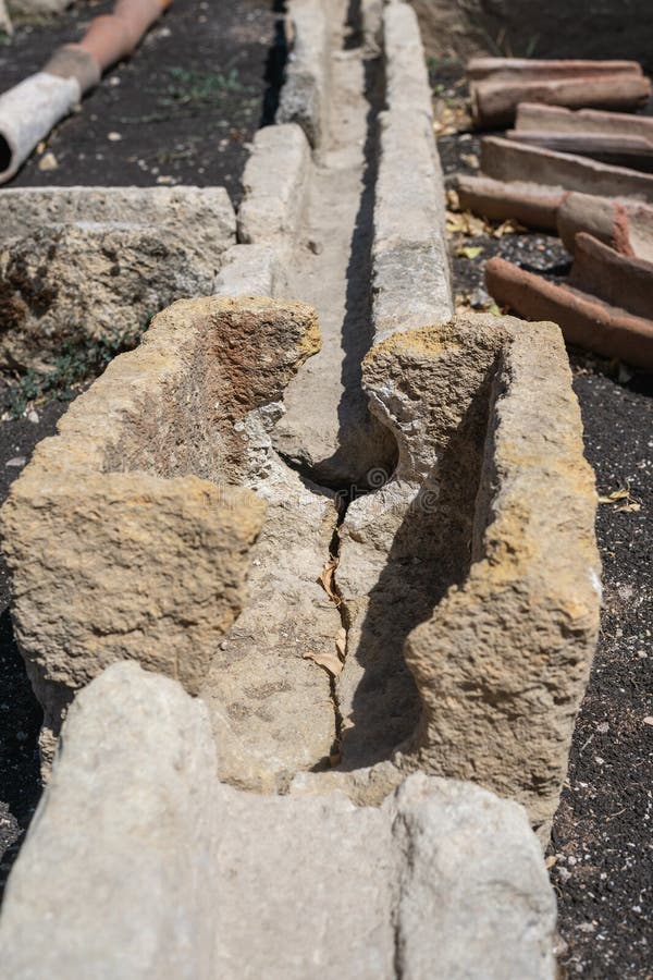 Ancient water gutter stock photo. Image of stone, ground - 302527672