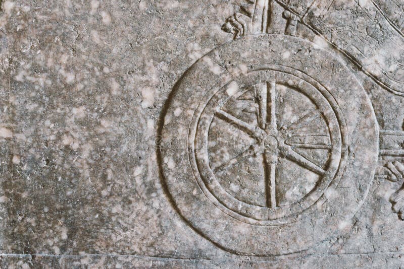 Ancient wheel relief stock image. Image of ancient, stone - 152764349