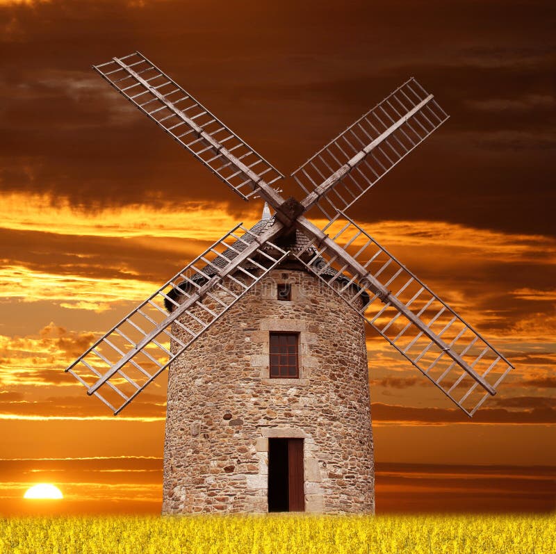 Ancient Windmill at sunset stock photo. Image of wind - 112186898