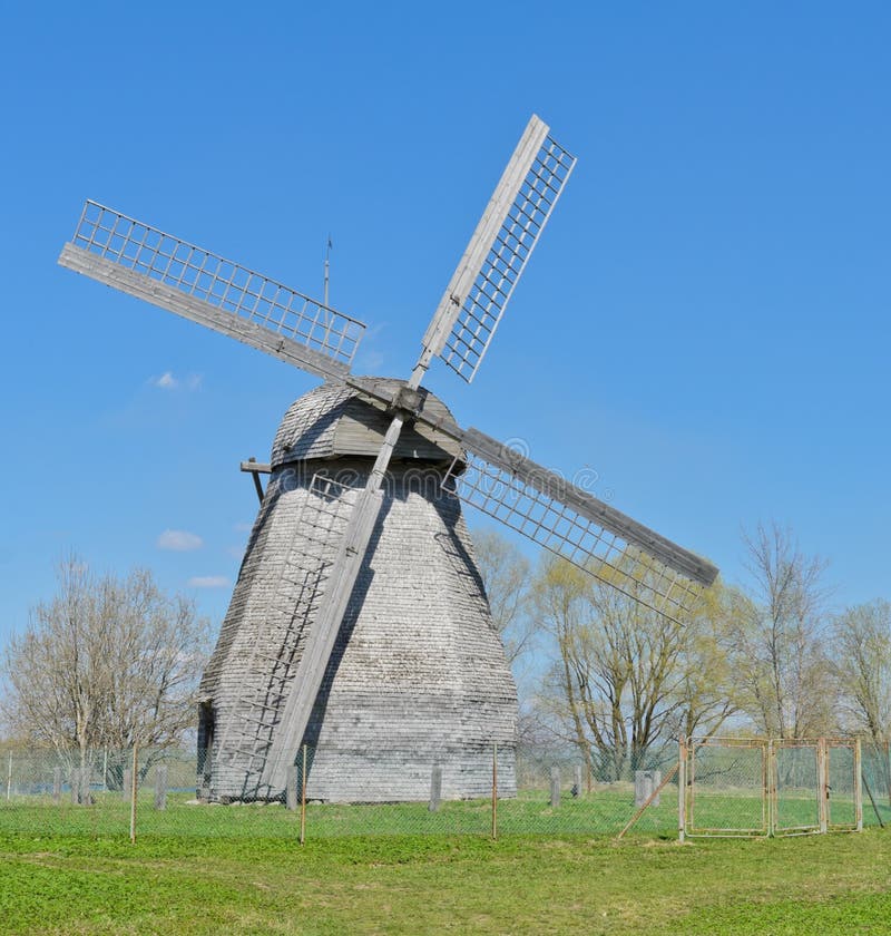 Ancient wooden windmill stock image. Image of blue, landscape - 32406185