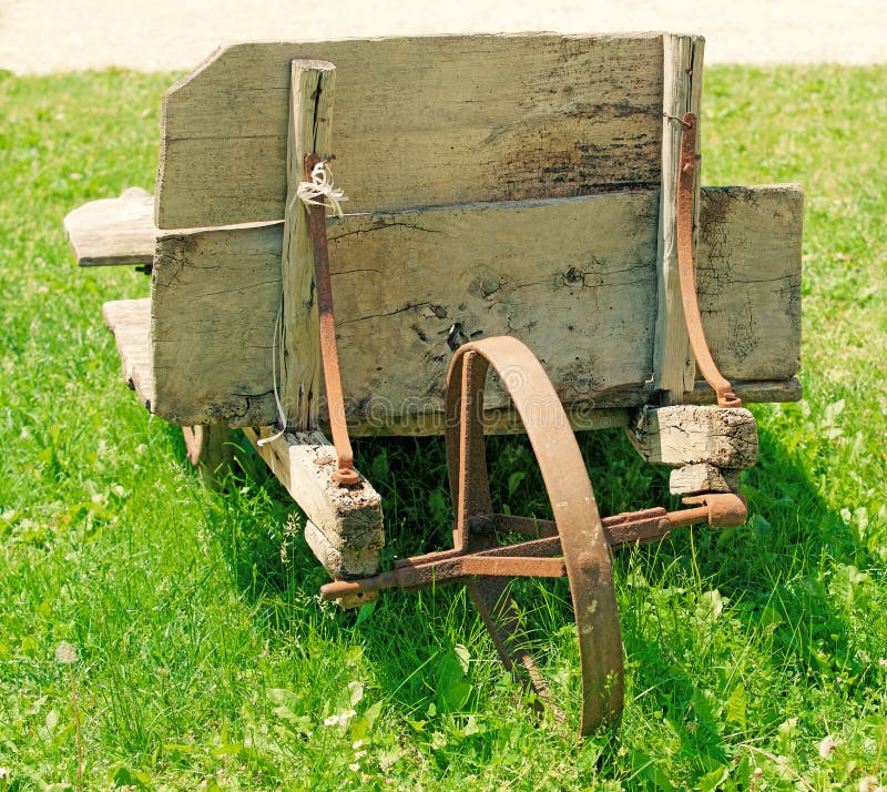 Ancient Wheelbarrow in the Countryside Stock Photo - Image of bush ...