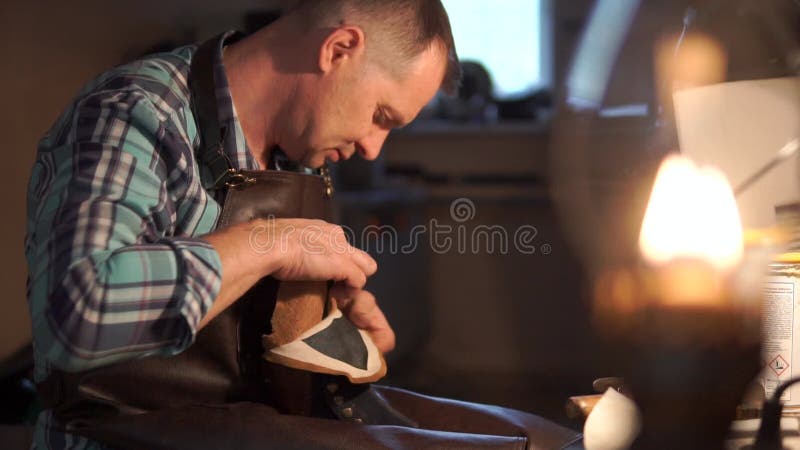 Ancient Workshop with Expert Shoemaker during the Processing of Leather ...