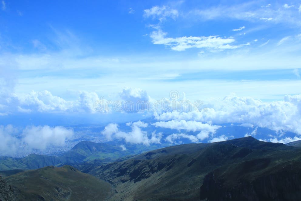 An Andean Mountain Ridge with a Stunning Cloudscape and Bright Blue Sky ...
