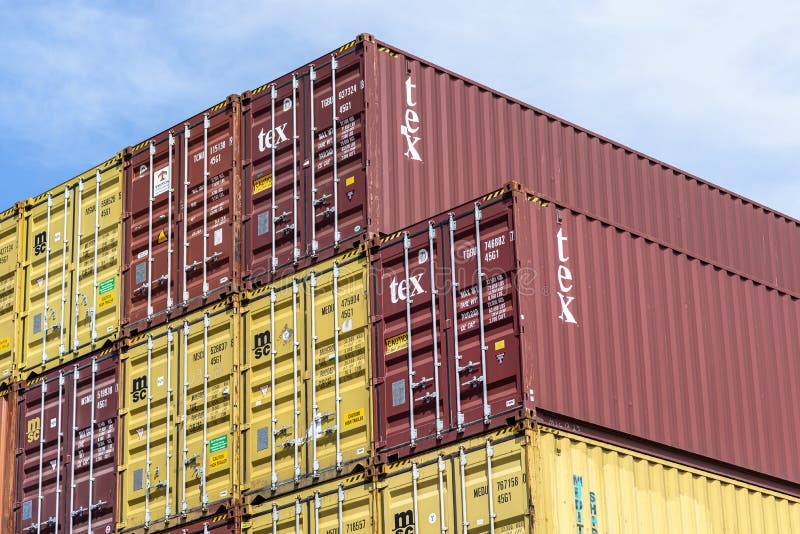 A Stack of Containers Standing on Top of Each Other in the Loading Yard ...
