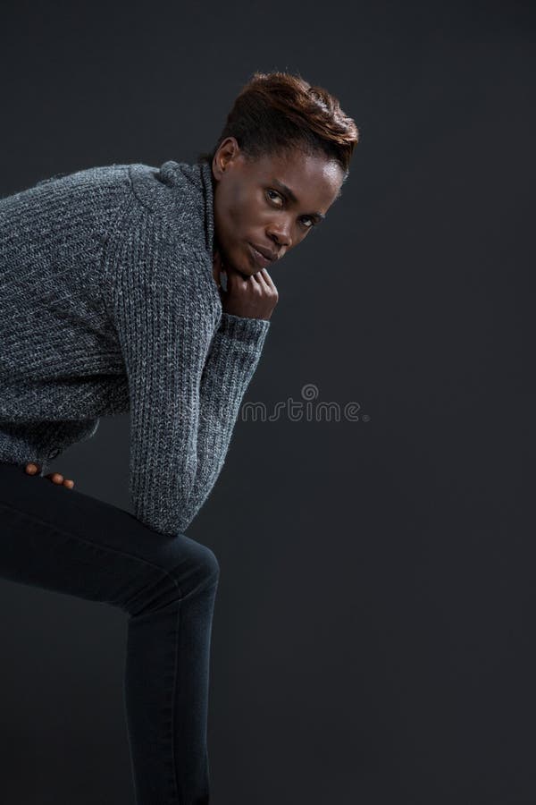 Androgynous Man Posing with Hand on His Chin Stock Image - Image of ...