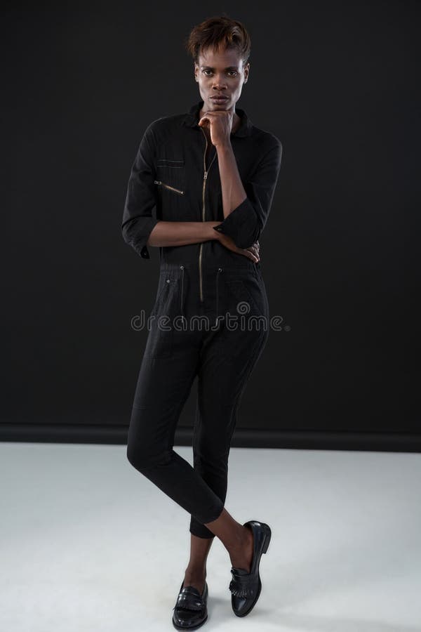 Androgynous Man Posing with Hand on His Chin Stock Photo - Image of ...