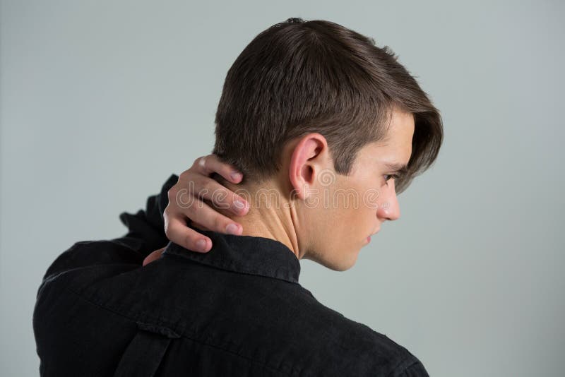 Androgynous Man Touching His Neck Stock Photo - Image of androgynous ...