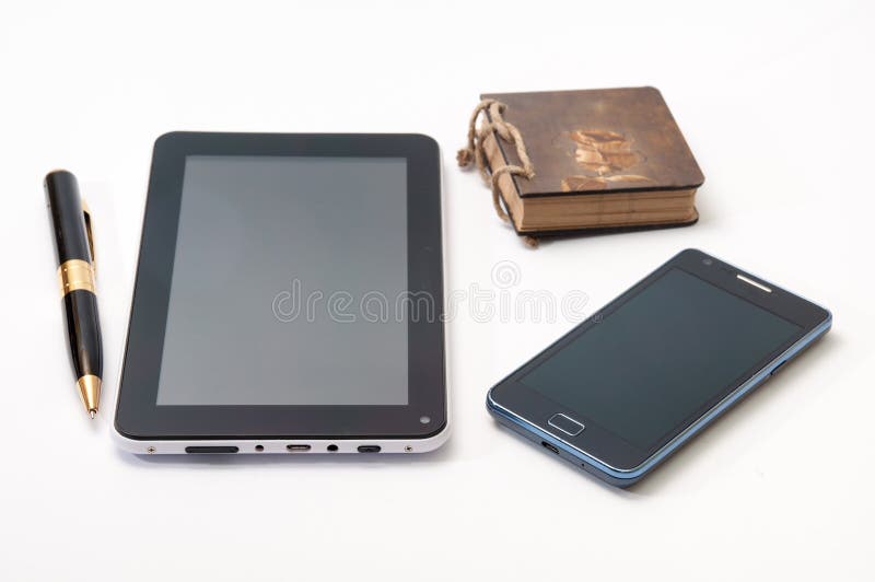 Android Tablet and Phone and Old Antique Paper Notebook with Black Pen ...