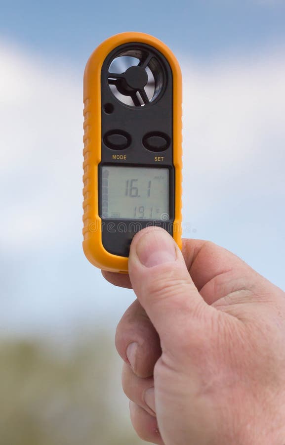 Anemometer in the Hand of Man, Wind Speed 16.1 Ms . Clouse-up Stock ...
