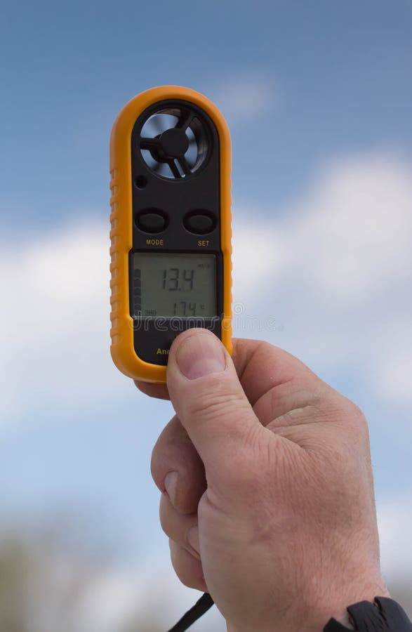Anemometer in the Hand of Man, Wind Speed 13.4 Ms . Clouse-up Stock ...