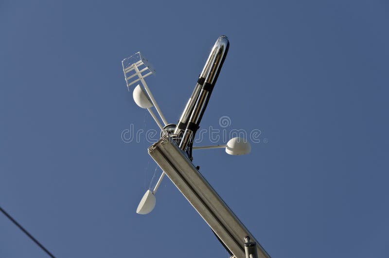 Anemometer Or Wind Speed Meter Silhouetted Against Blue Background ...