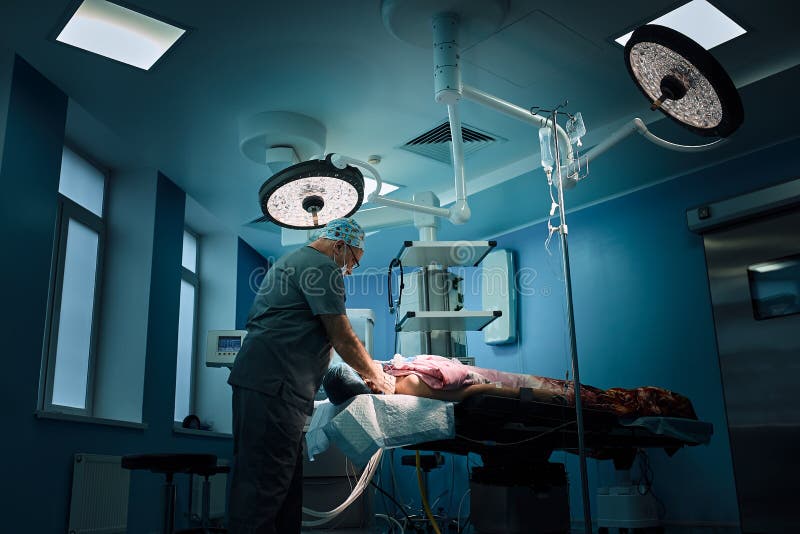 Anesthetist at a Operating Room Setting the Anesthesia Machine Stock ...