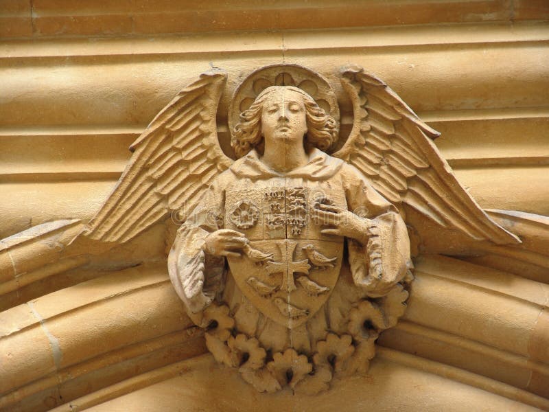 Angel on the Arch with Shield Stock Image - Image of design, carving ...