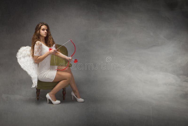 Angel with bow and arrow stock photo. Image of life, copy - 56879302