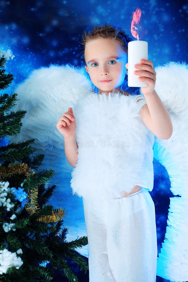Angel with candle stock photo. Image of happiness, angel - 12210802