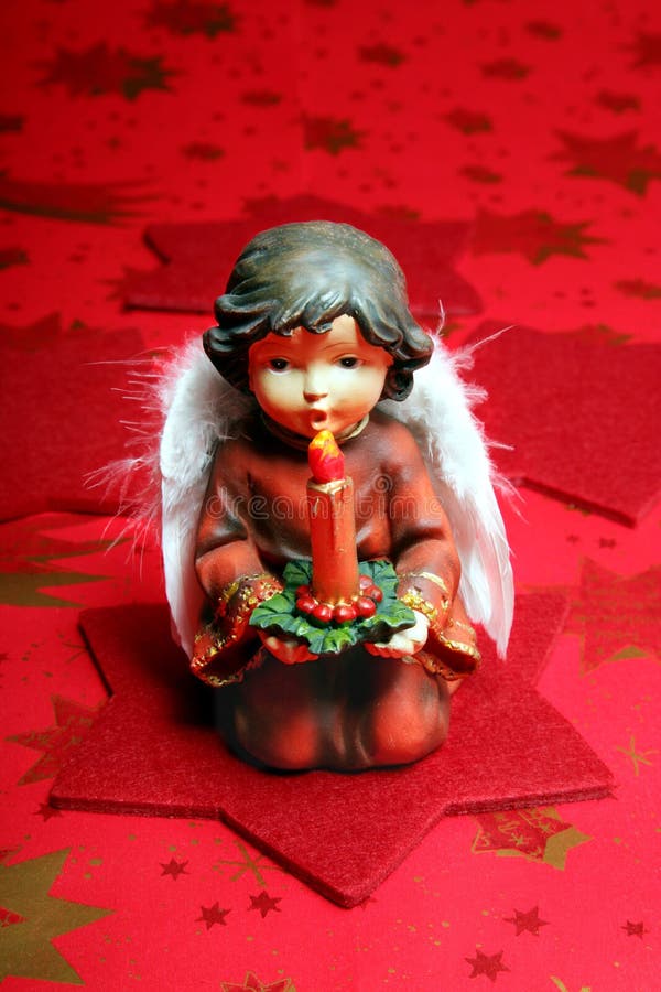 Angel with candle stock photo. Image of childhood, aura - 1527268