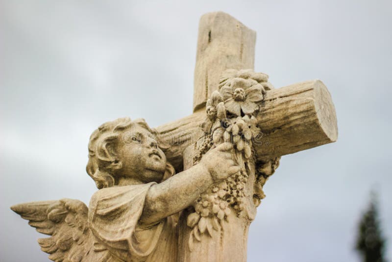 Angel and Cross Sculpted Statue Stock Photo - Image of sculpted, jesus ...