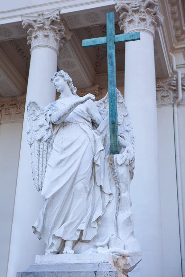 Angel with cross stock photo. Image of monument, innocence - 183072824
