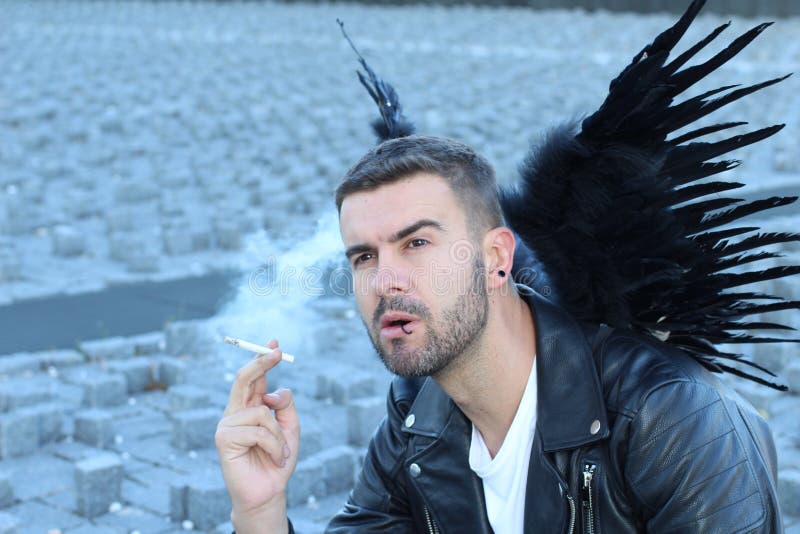 Angel with Dark Wings Smoking Stock Photo - Image of good, pleasure ...