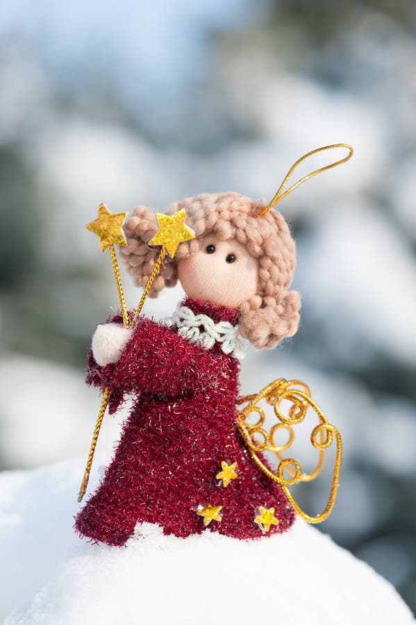 Angel doll on snowdrift stock image. Image of covered - 29148787