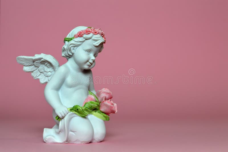 Angel on pink background stock photo. Image of feather - 109772872