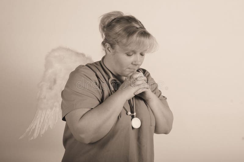 Angel praying nurse stock photo. Image of caring, trust - 1622678