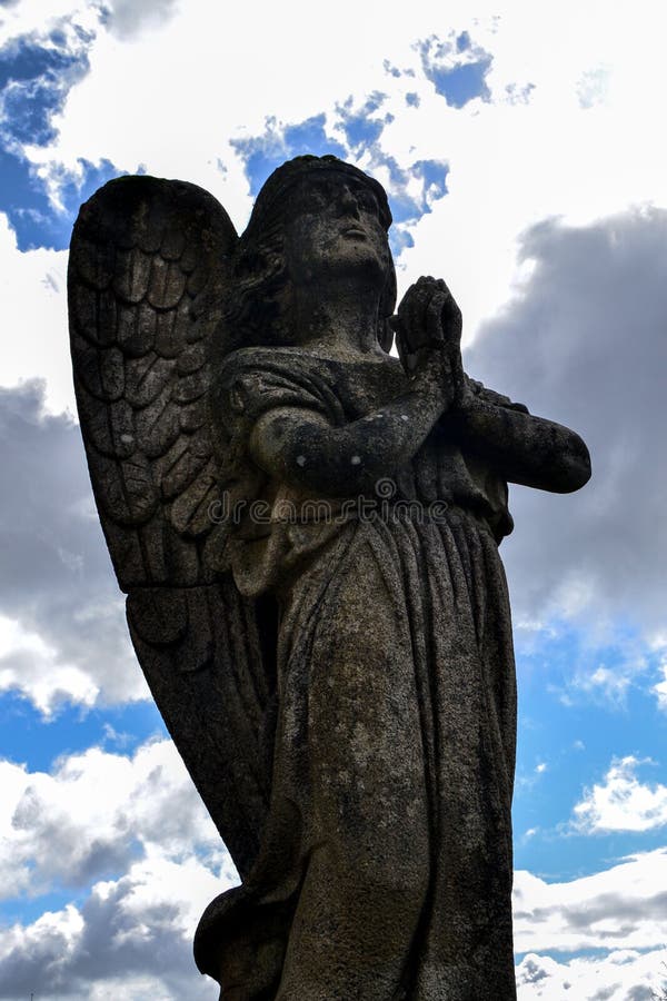 Angel praying stock photo. Image of angel, humanity, blue - 68547772