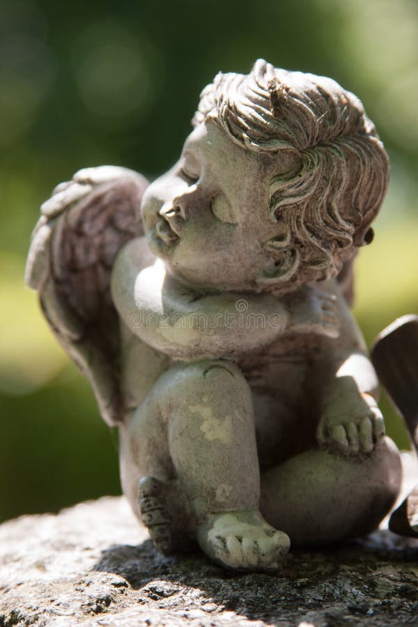 Angel sitting and dreaming stock image. Image of dream - 43607349