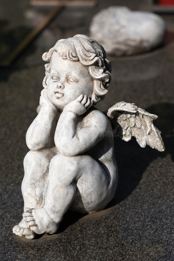 Angel sitting in the sun stock image. Image of love, halo - 64187555