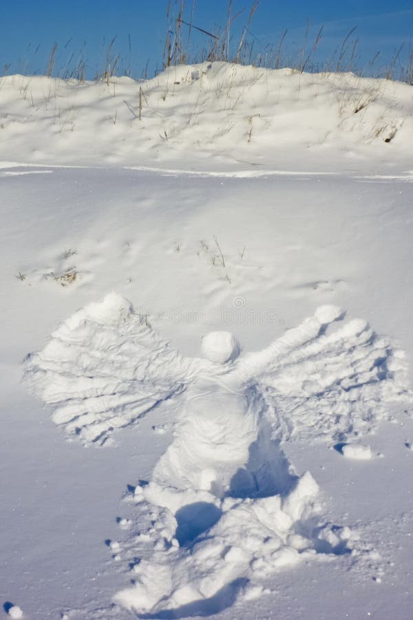 Angel in the snow stock photo. Image of shape, snowcovered - 34449580