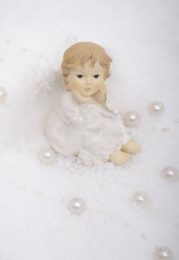 Angel in snow with pearls stock image. Image of angel - 17477295