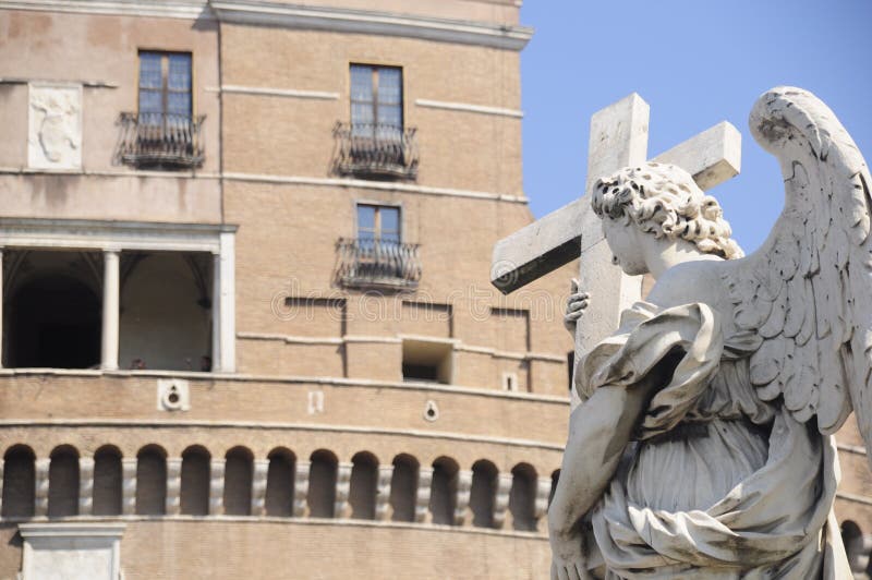 Angel statue with crucifix stock image. Image of closeup - 11077783