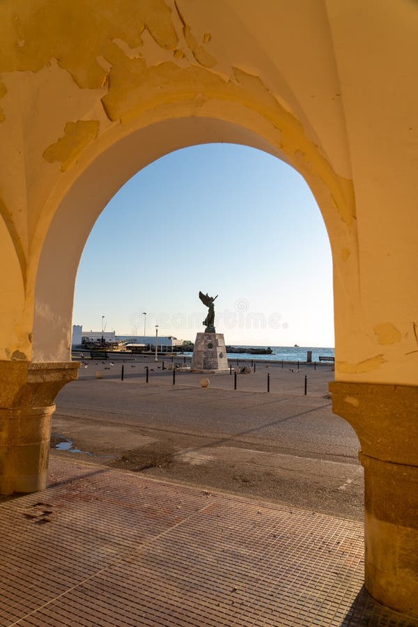 Angel Statue of Victory at Sunset Framed in an Arch Editorial Stock ...