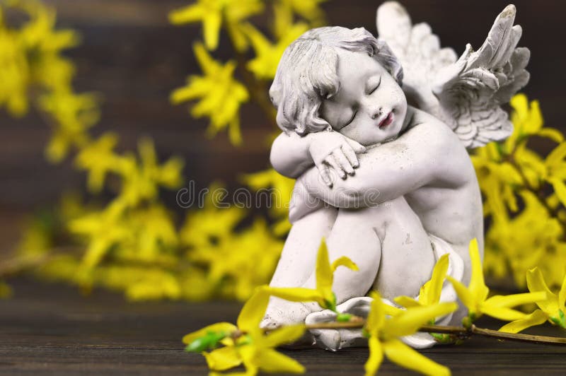Angel and spring flowers stock photo. Image of christianity - 139005198