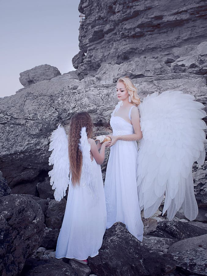 Angels on the beach stock image. Image of model, flying - 97452989
