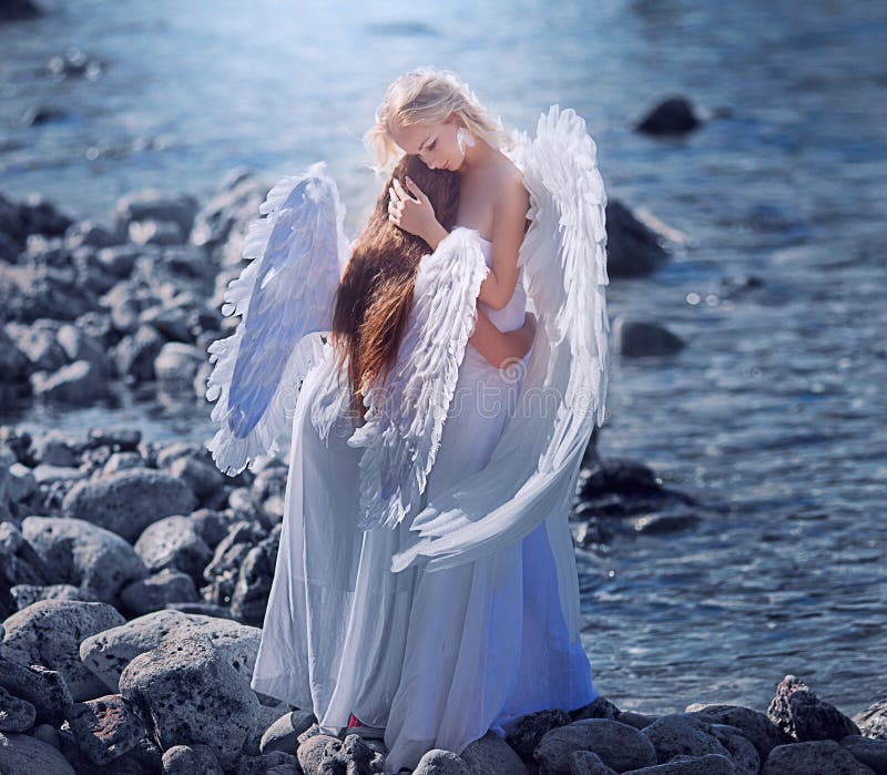 Angels on the beach stock photo. Image of daughter, infant - 97967498