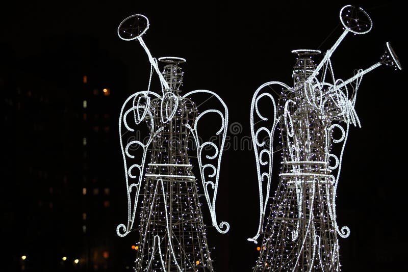 Angels in the night city stock photo. Image of nightlife - 37924028