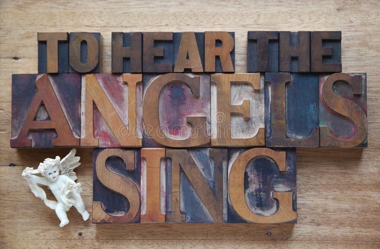 Angels Sing Words with Angel Figure Stock Photo - Image of carol ...