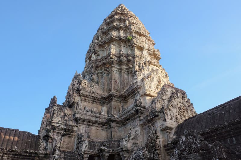Angkor Wat Stone Tower Under Vibrant Blue Sky Stock Image - Image of ...