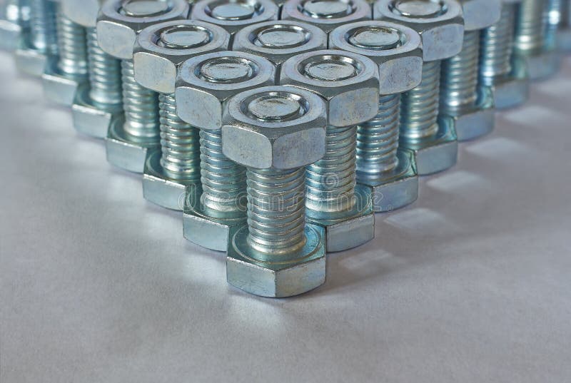 Angle of bolts and nuts stock photo. Image of macro, industrial - 39556048