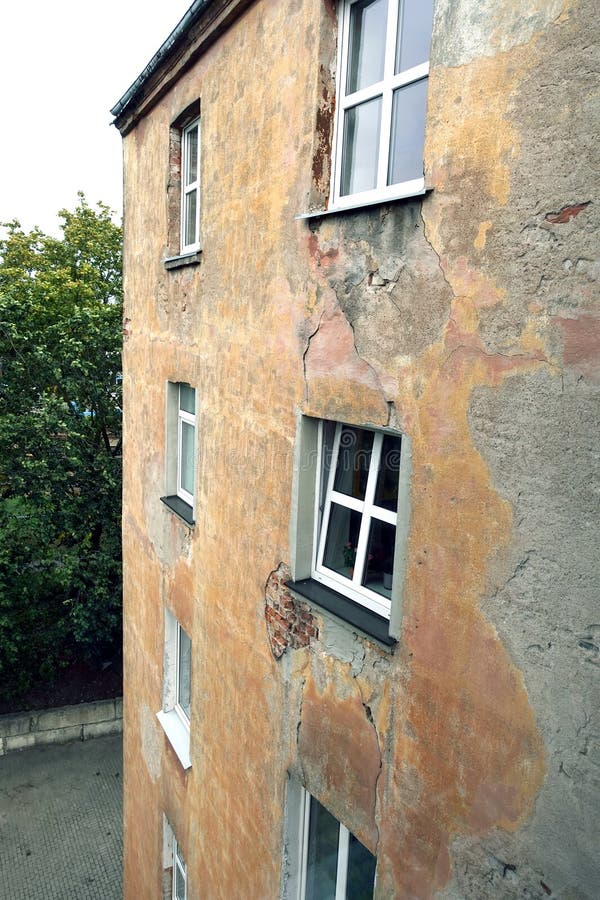 Angle Buildimg Wall in Bad Condition with New Plastic Windows Side View ...