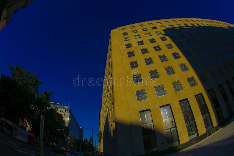 The Angle of the Curly Building Stock Image - Image of glasses, signs ...