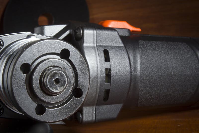 Angle grinder on the table stock photo. Image of industrial - 173784474