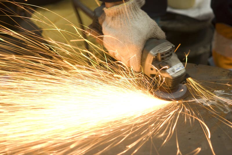 Angle grinder in use stock image. Image of production - 5851017