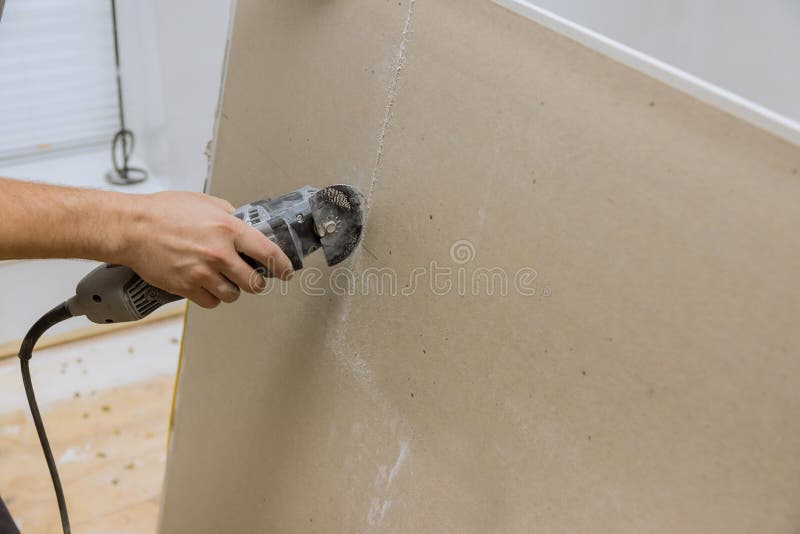 Angle Hand Electric Power Tools Cut Drywall Sheet Stock Photo - Image ...