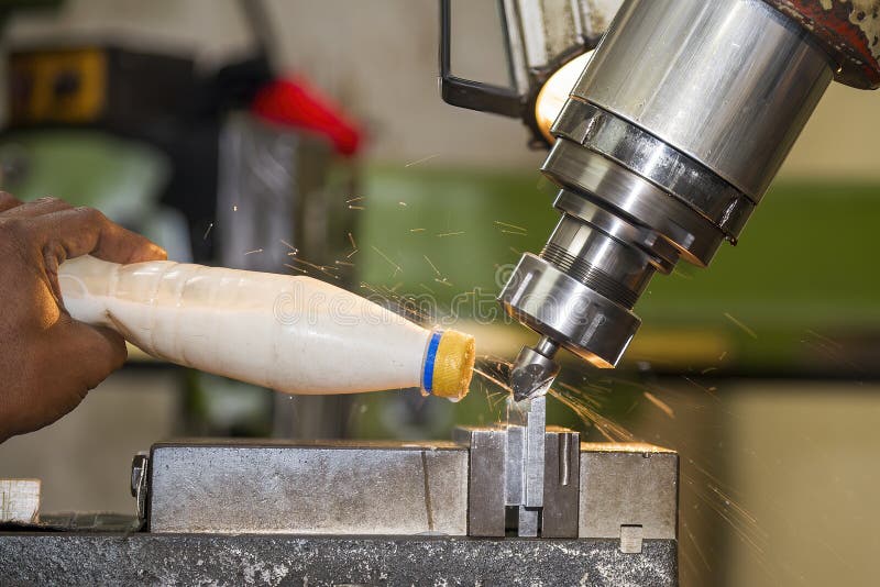 The Angle Milling Process on NC Milling Machine with Liquid Coolant ...