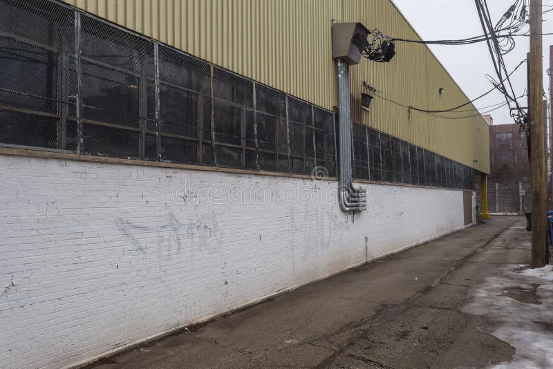 Angle View on the Back of an Industrial Warehouse on Overcast Day Stock ...