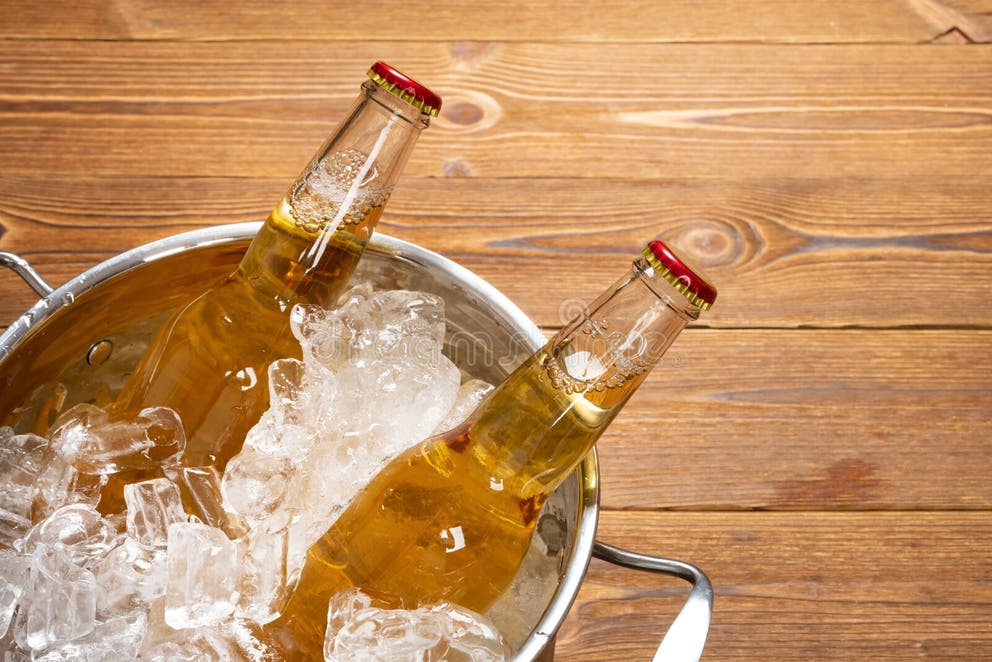 Bottles of Beer in a Still Bucket with Ice Stock Photo - Image of ...