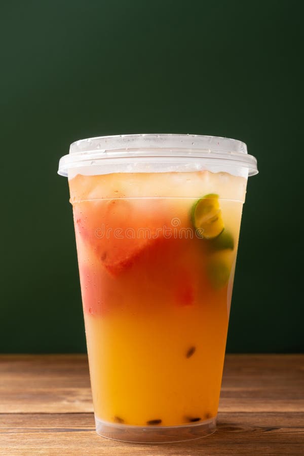 Cup of Iced Fruit Drink at Vertical Composition Stock Photo - Image of ...