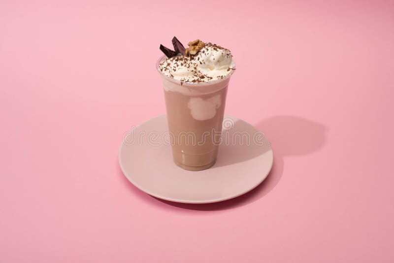 Angle View of Disposable Cup of Chocolate Milkshake on Plate on Pink ...